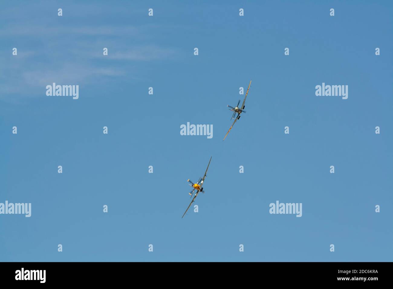 A Supermarine Spitfire and North American P-51 Mustang flying in tandem ...