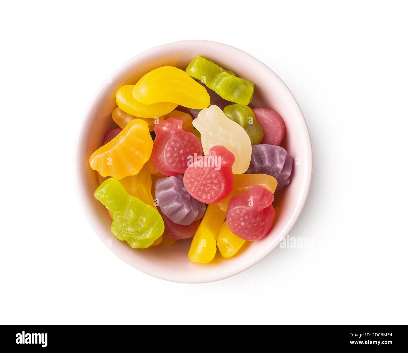 Colorful fruity jelly candies isolated in bowl on white background ...