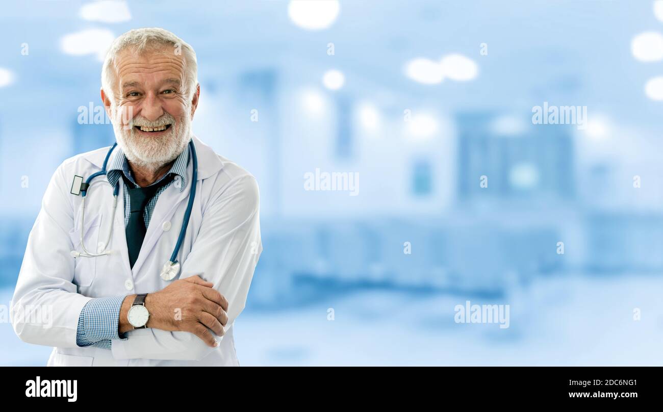Senior male doctor working at the hospital. Medical healthcare and ...