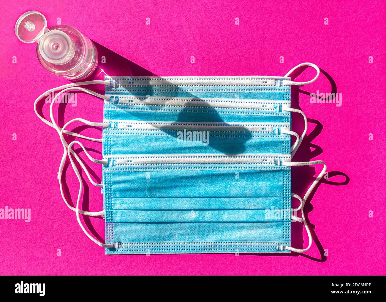 Medical mask, medical protective mask on fuchsia background with copy ...