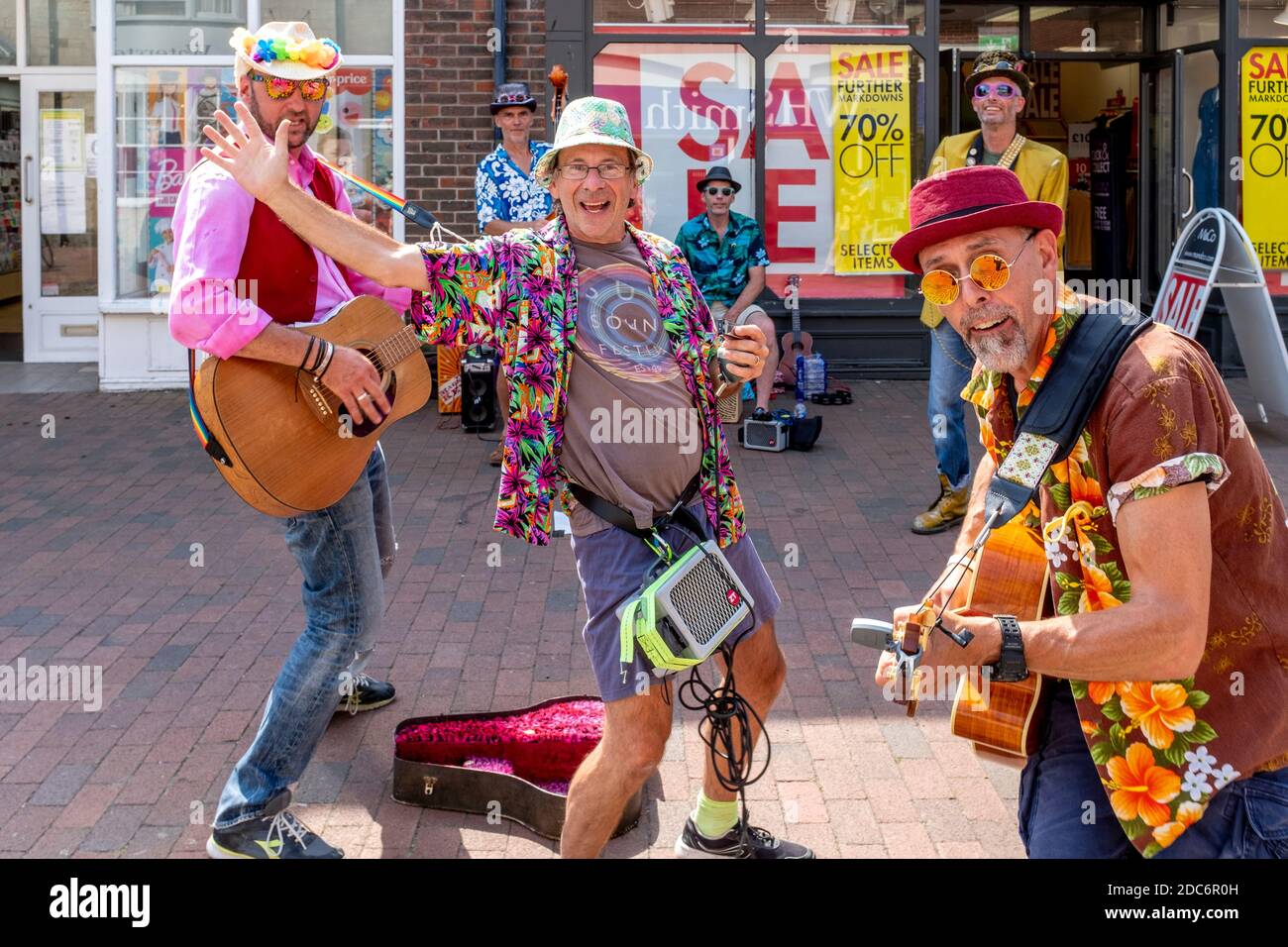 A Group Of Colourfully Dressed Men Busking In The High Street, Lewes ...