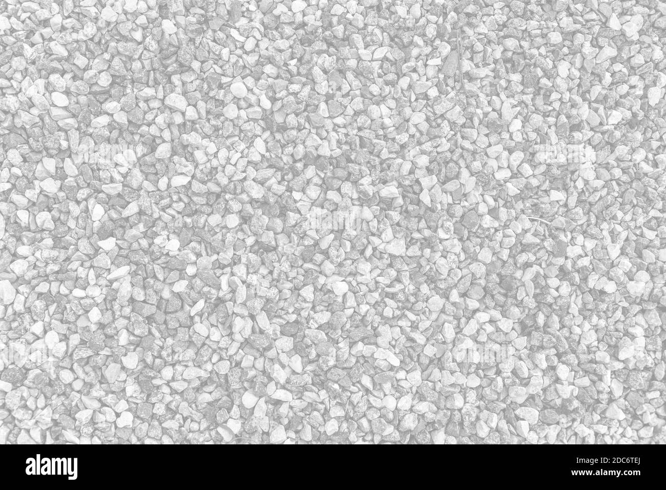 Different colored rocks and pebbles on a beach. Various colors and ...