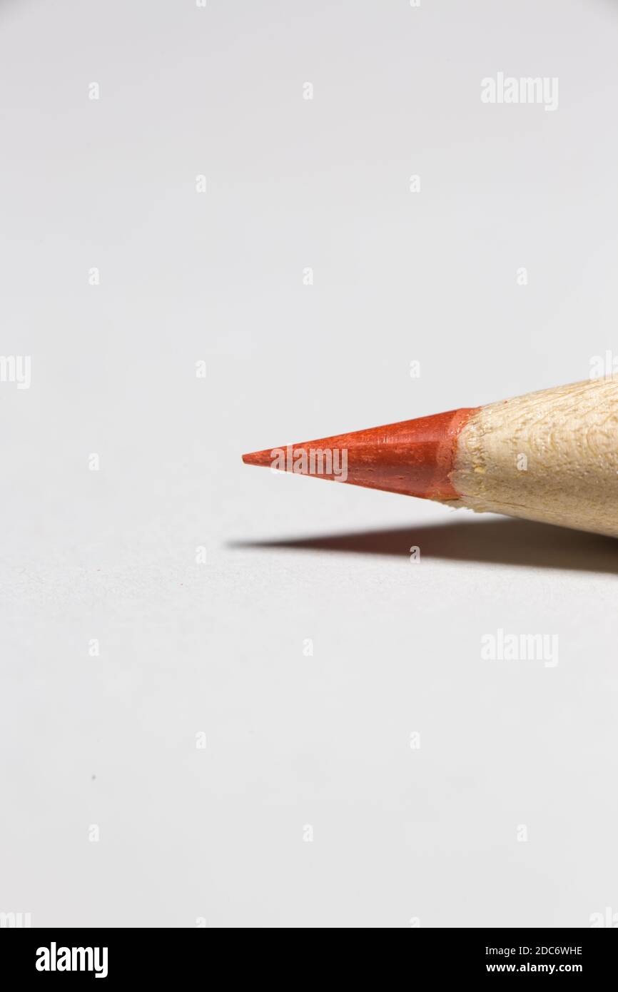 Extreme close upof red pencil on white background Stock Photo - Alamy