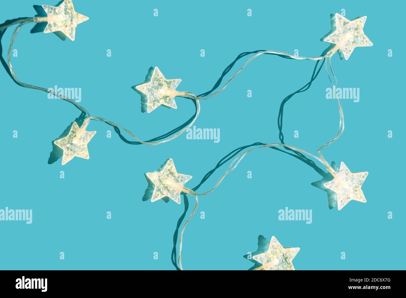 Christmas minimal festive background with star garland. Abstract ...
