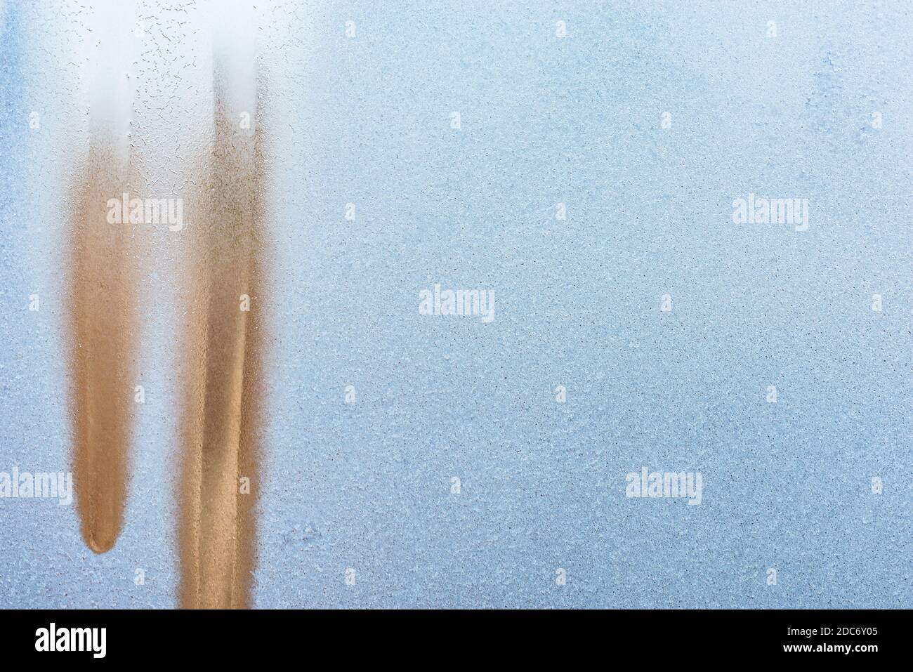 Melting of the ice on the window glass surface Stock Photo - Alamy