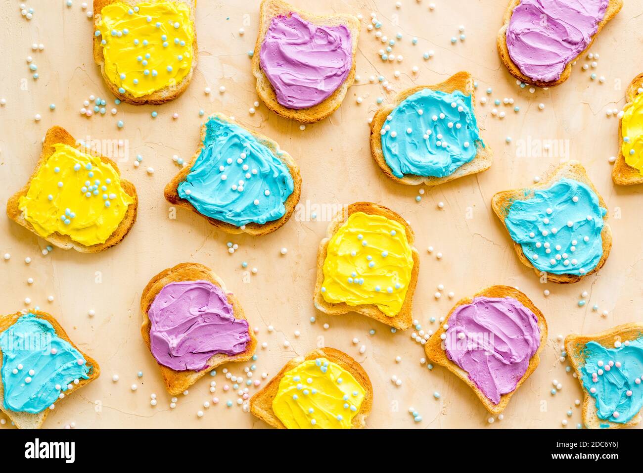 Unicorn colored toast bread slices. Food background, top view Stock ...