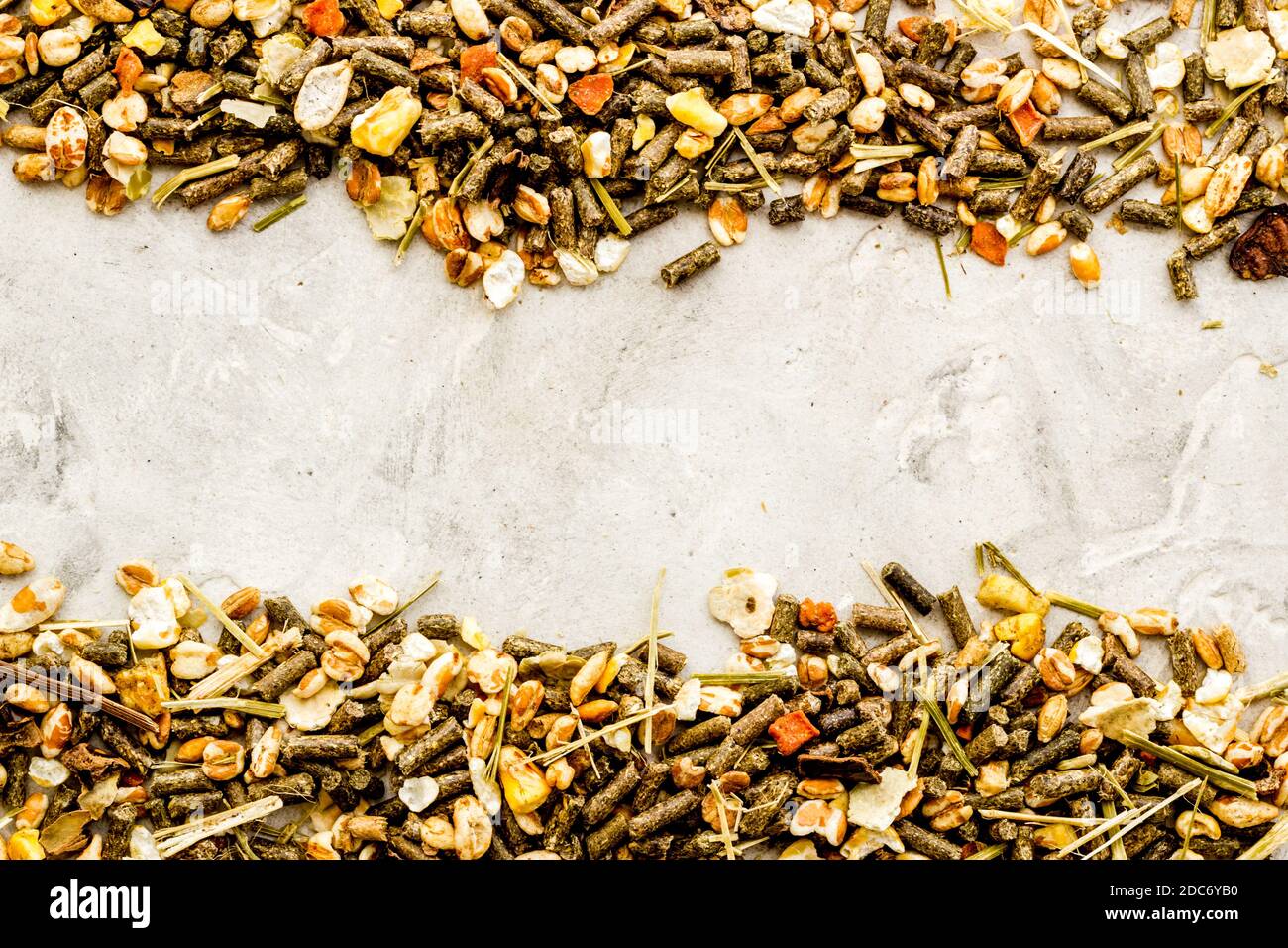 Frame of rodent dry food, treats for pet, top view Stock Photo - Alamy