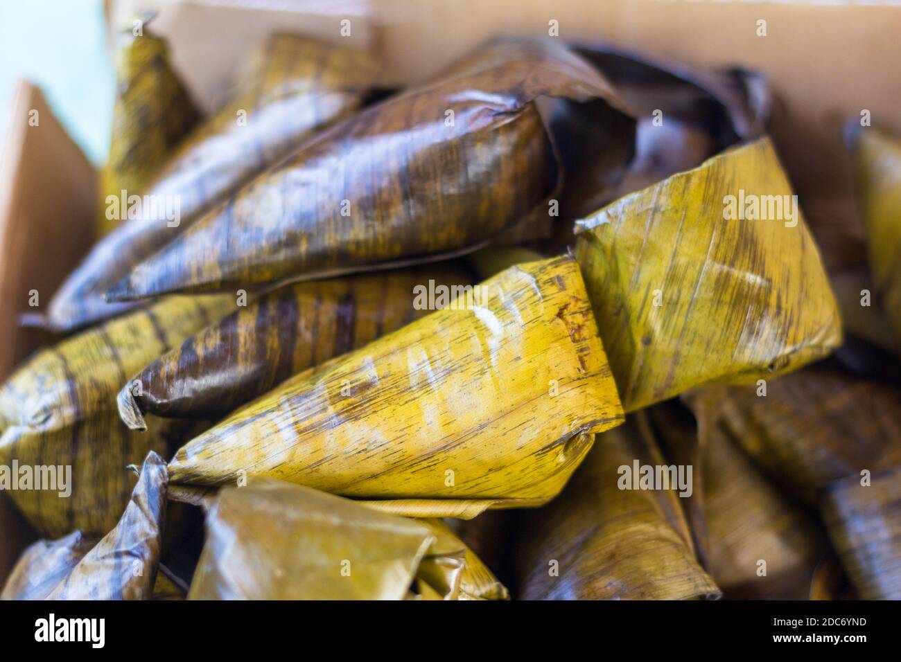 Rice cake wrapped in banana leaves in Sagada, Philippines Stock Photo ...