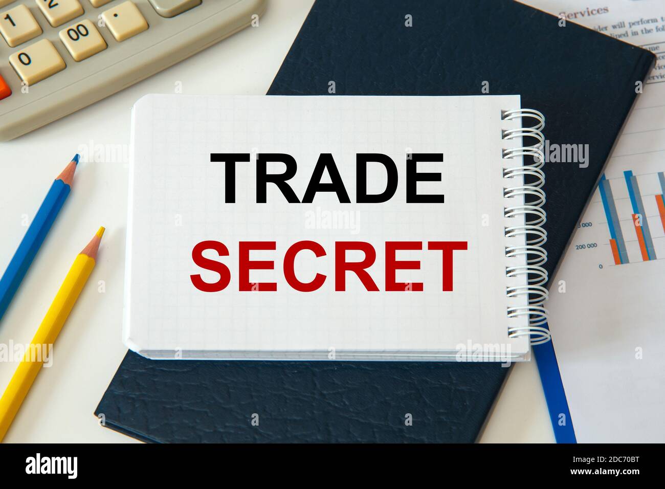 Notebook with the text Trade Secret on the office table among the stationery Stock Photo - Alamy