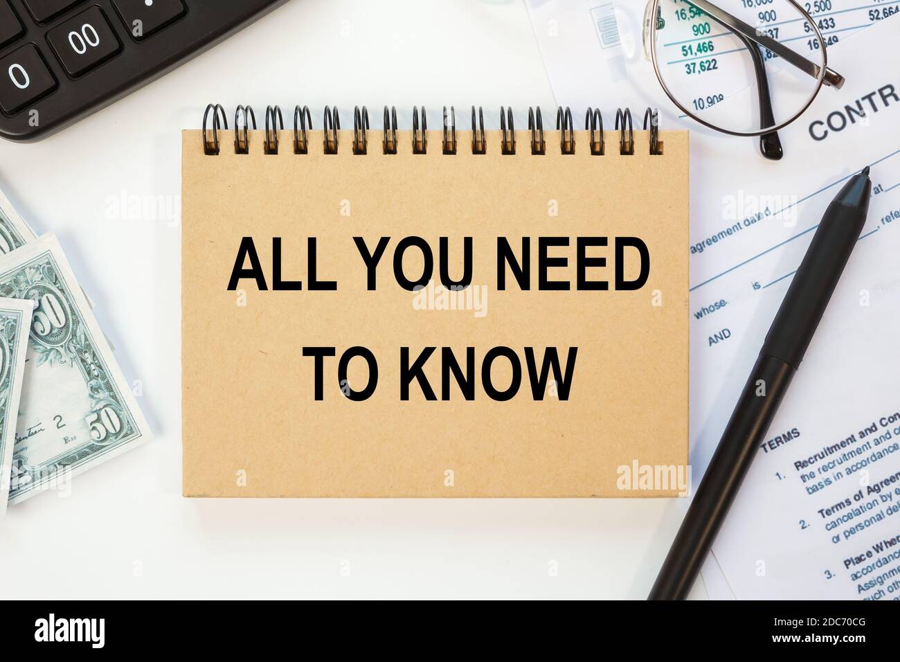 Notebook with the text - All you need to know - on the office table among the stationery Stock ...