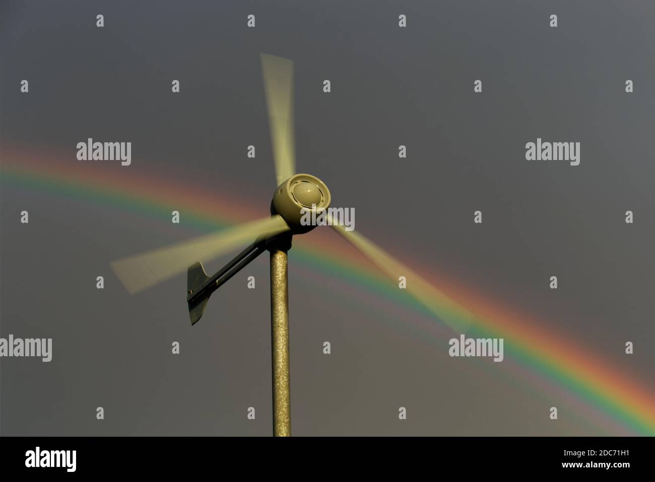 Wind turbine with rainbow Stock Photo - Alamy