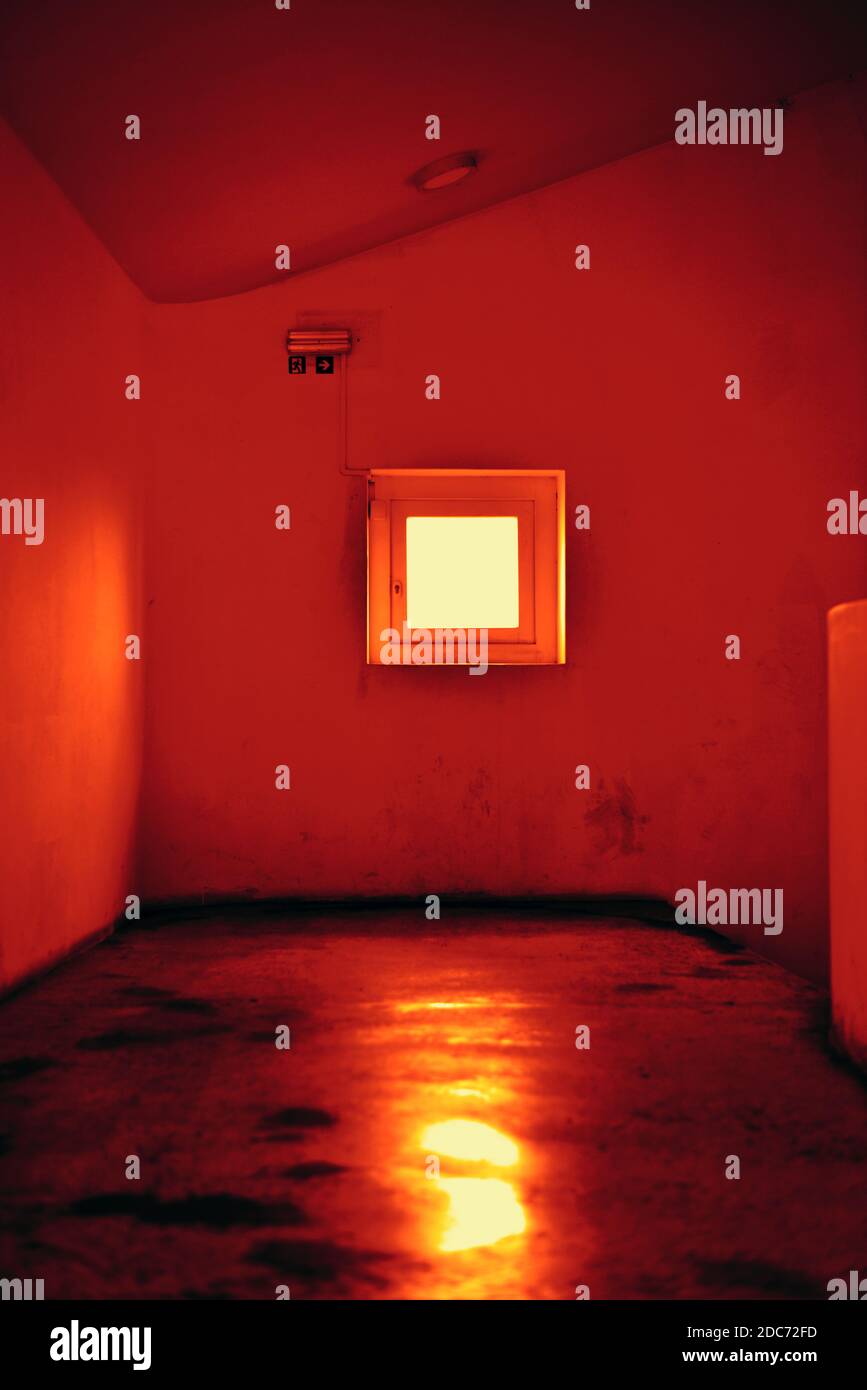 Small window in an empty room Stock Photo - Alamy
