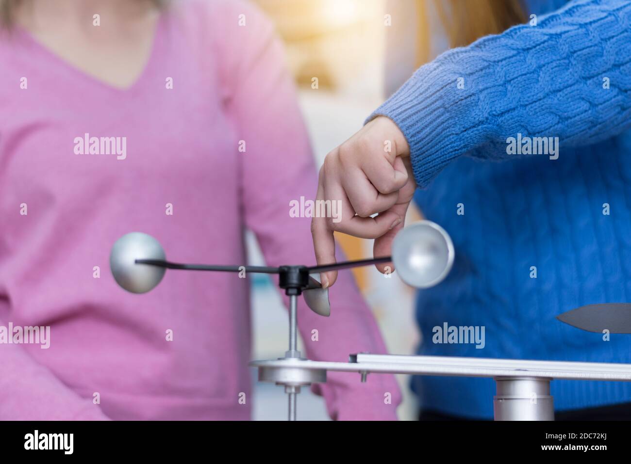 Scientists engineers designing small human robot, setting artificial ...