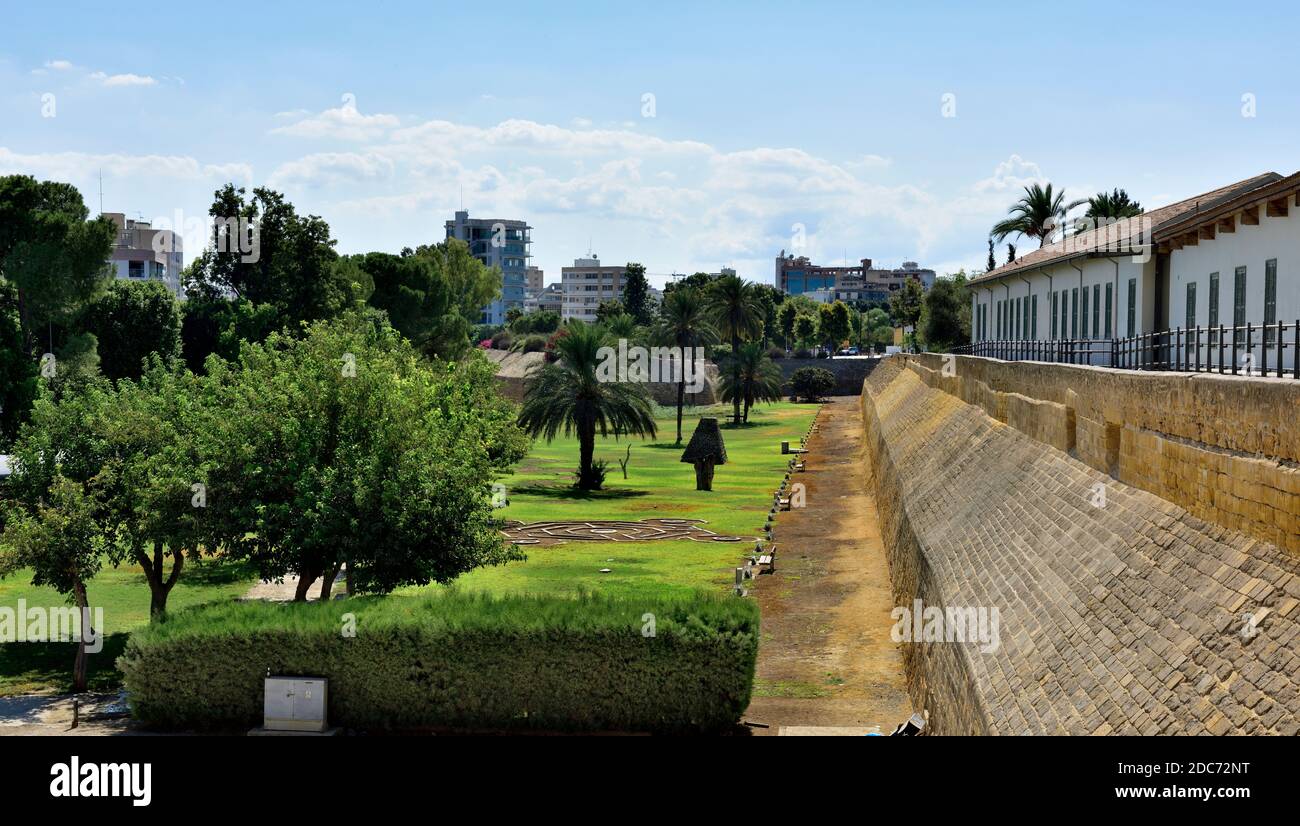 Medieval defensive Venetian wall above municipal gardens built in moat ...
