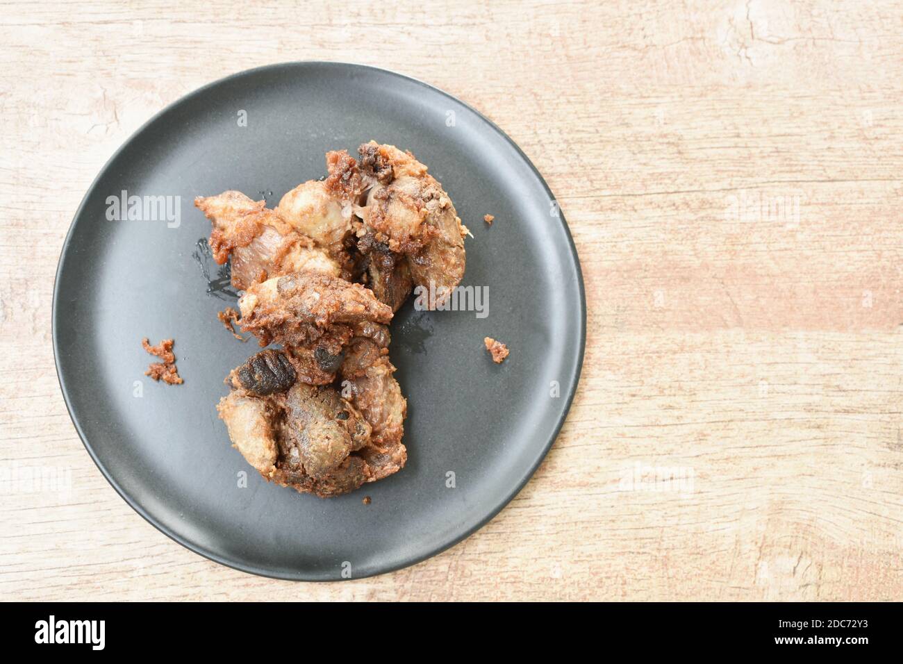 deep fried chicken liver and gizzard on plate Stock Photo - Alamy