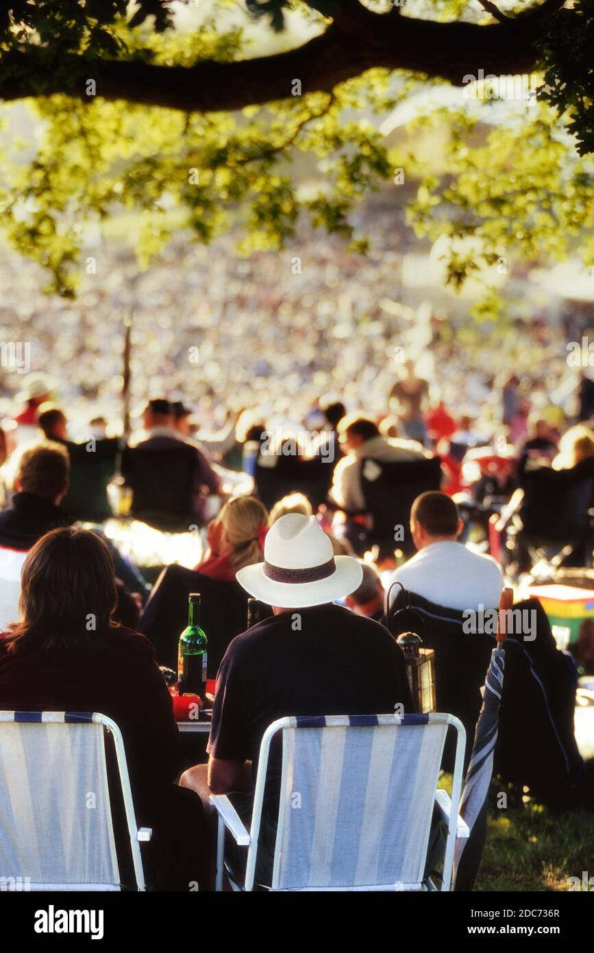 Outdoor classical concert crowd at Leeds Castle, Kent, England, UK ...