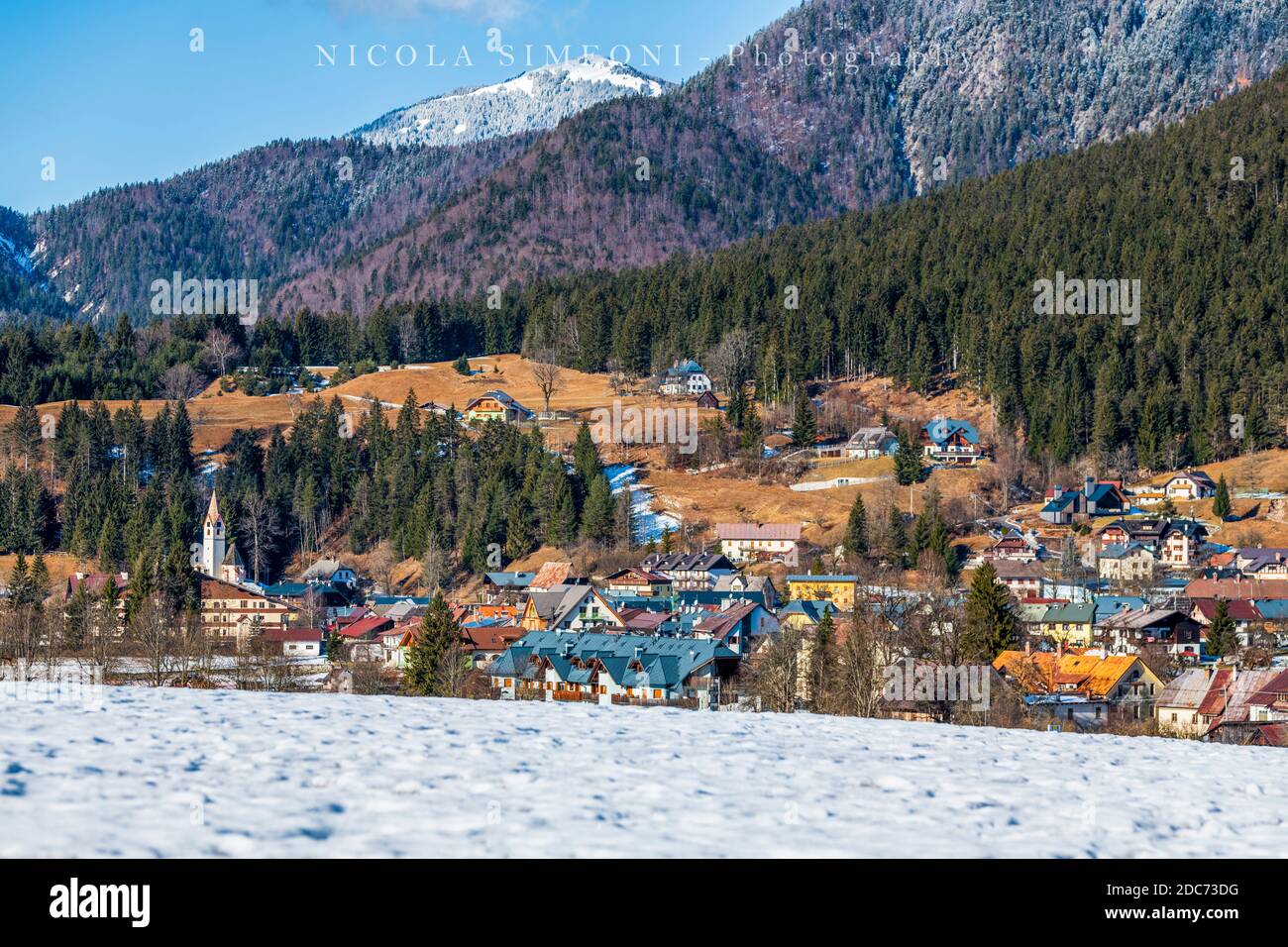 Last snow on the Camporosso plain. Tarvisio. Italy Stock Photo - Alamy