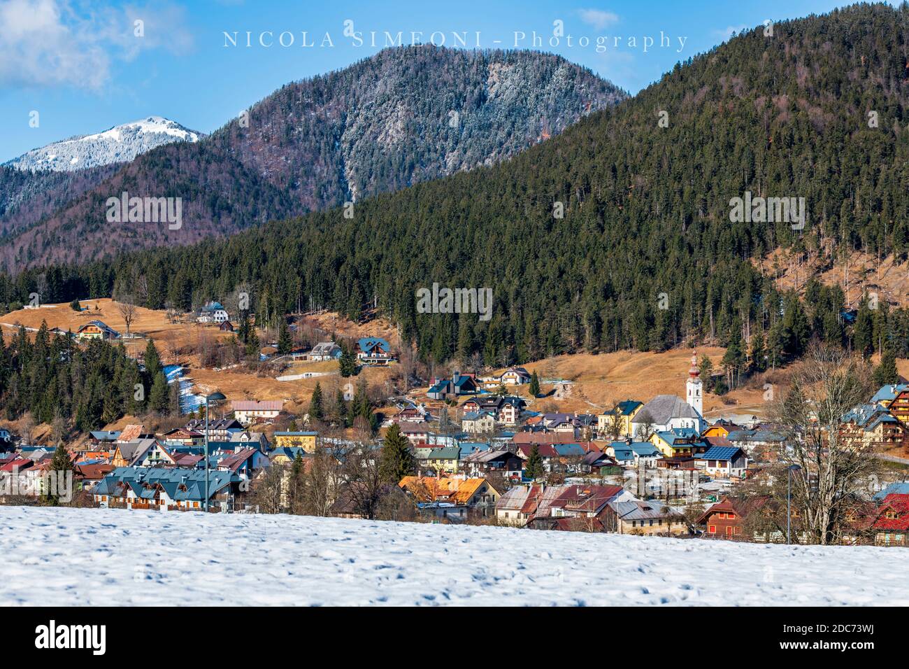 Last snow on the Camporosso plain. Tarvisio. Italy Stock Photo - Alamy