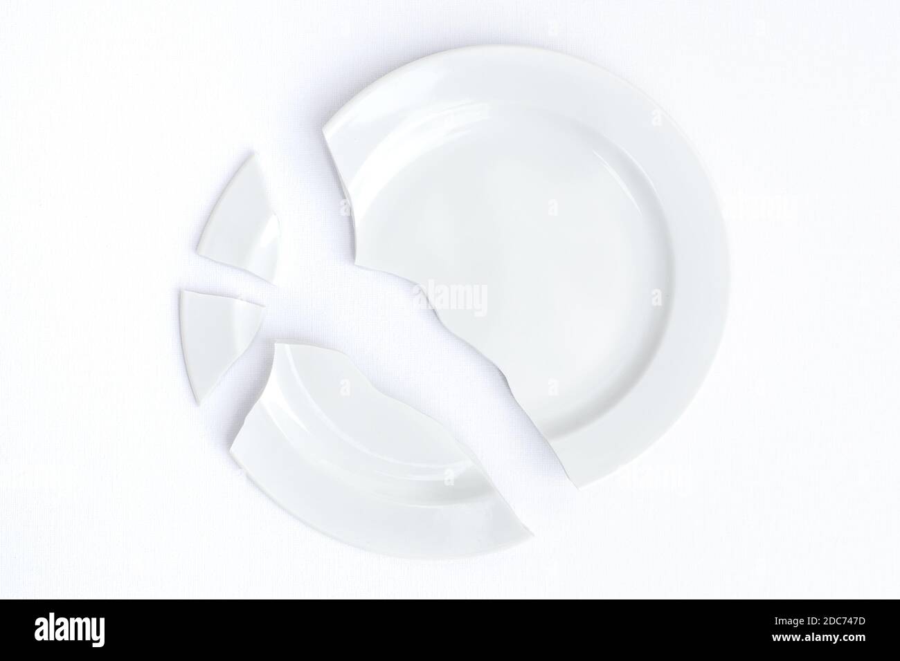 Shattered plate Cut Out Stock Images & Pictures - Alamy