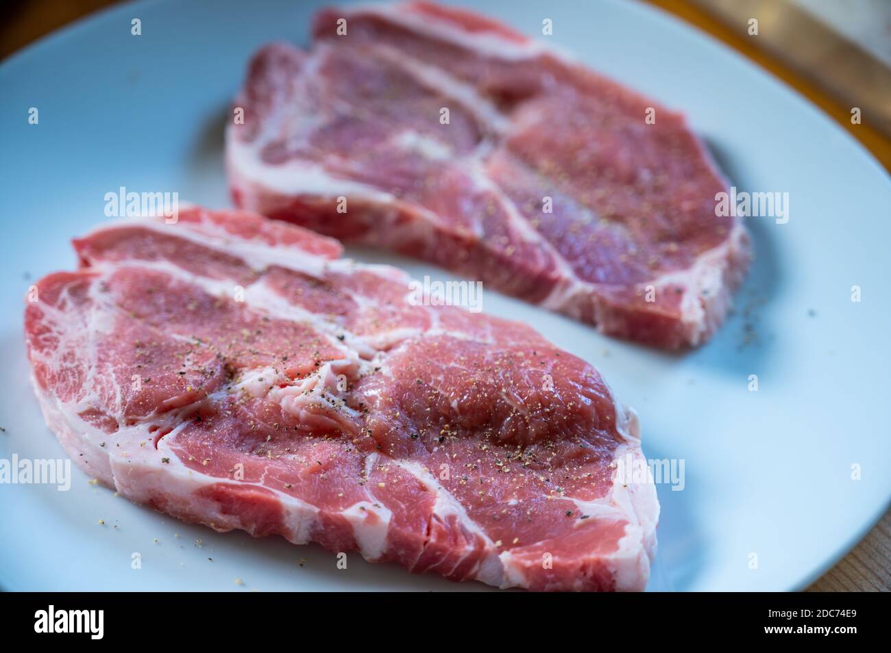 fresh neck steaks of pork with beautiful meat grain Stock Photo - Alamy