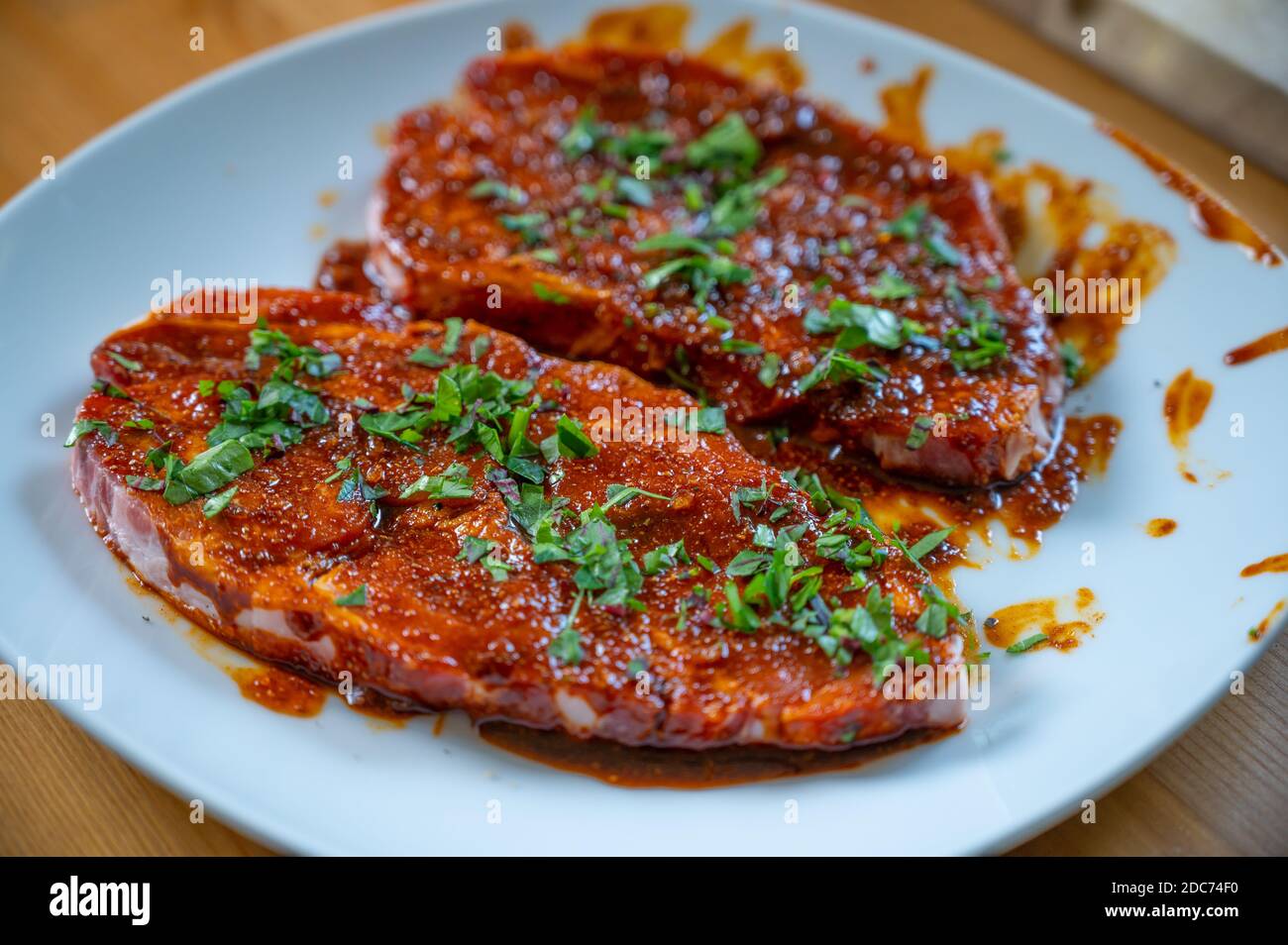 fresh neck steak of pork marinated with paprika and oil with fresh ...