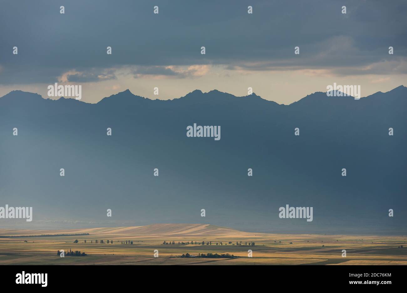 Sun on the fields near Karakol and Issyk Kul in Kyrgyzstan Stock Photo ...