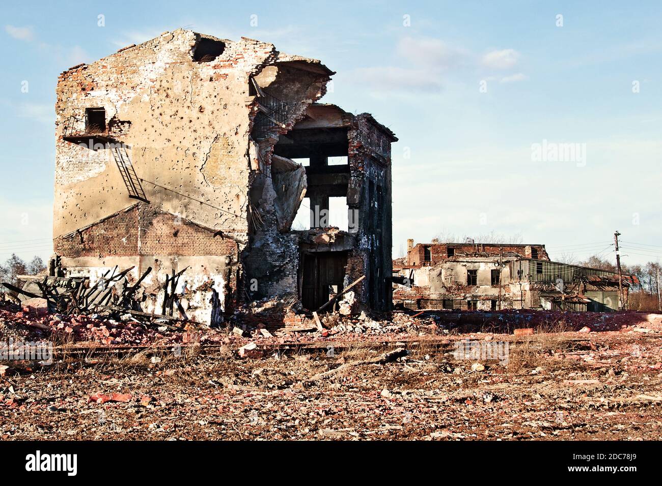 Landscape of ruined buildings at sunset, image of decrepitude or ...