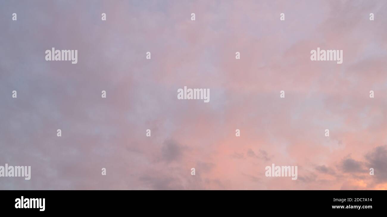sky in the evening with light red and clouds in different shades of ...