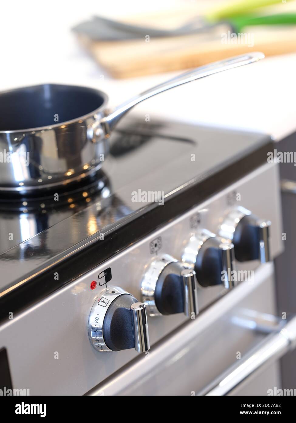 Electric oven and hob cooker in designer kitchen Stock Photo - Alamy