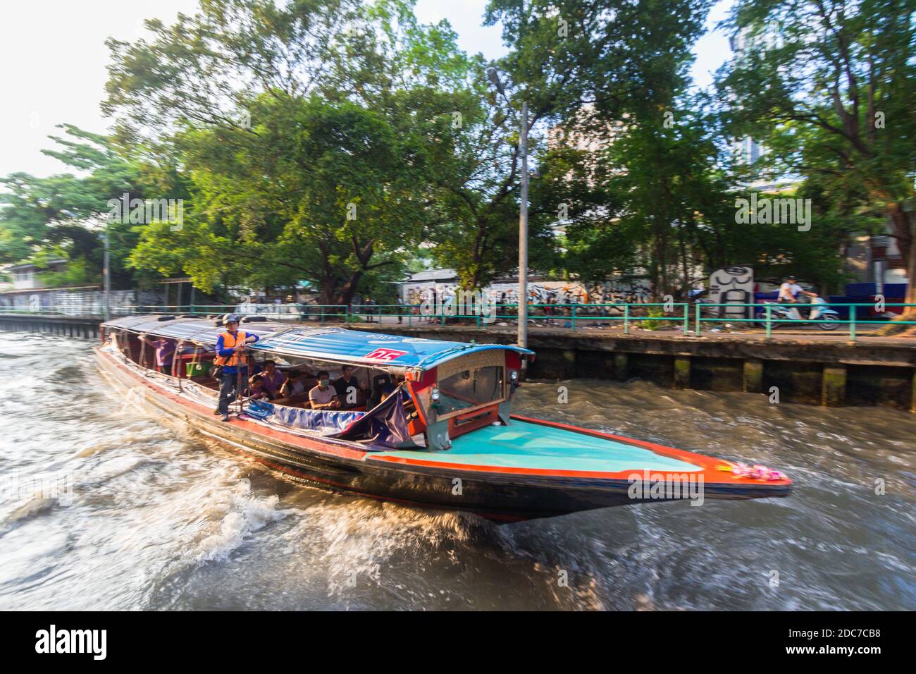 Thai khlong boats with passengers in Bangkok, Thailand Stock Photo - Alamy