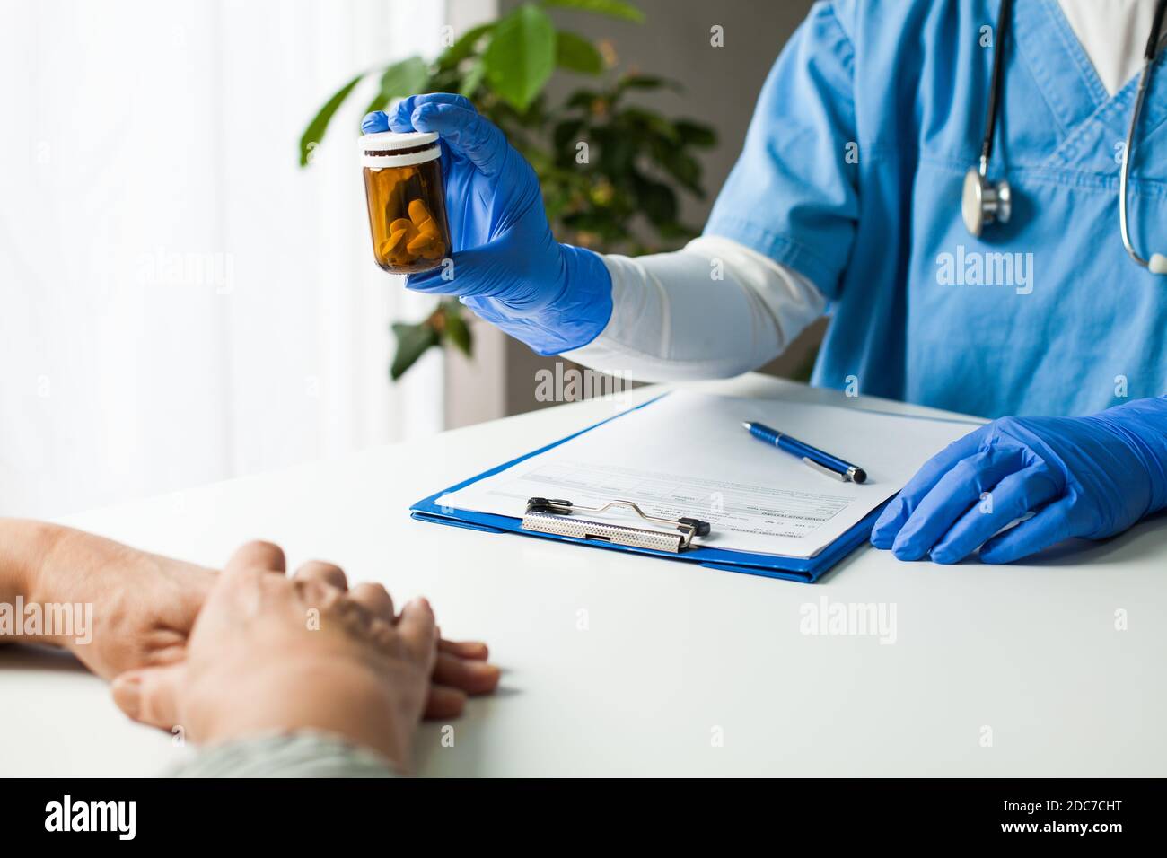 Handing drugs hi-res stock photography and images - Alamy