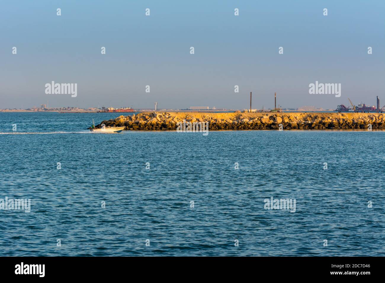 Stone dam under twilight at the sea of Dammam, Kingdom of Saudi Arabia ...