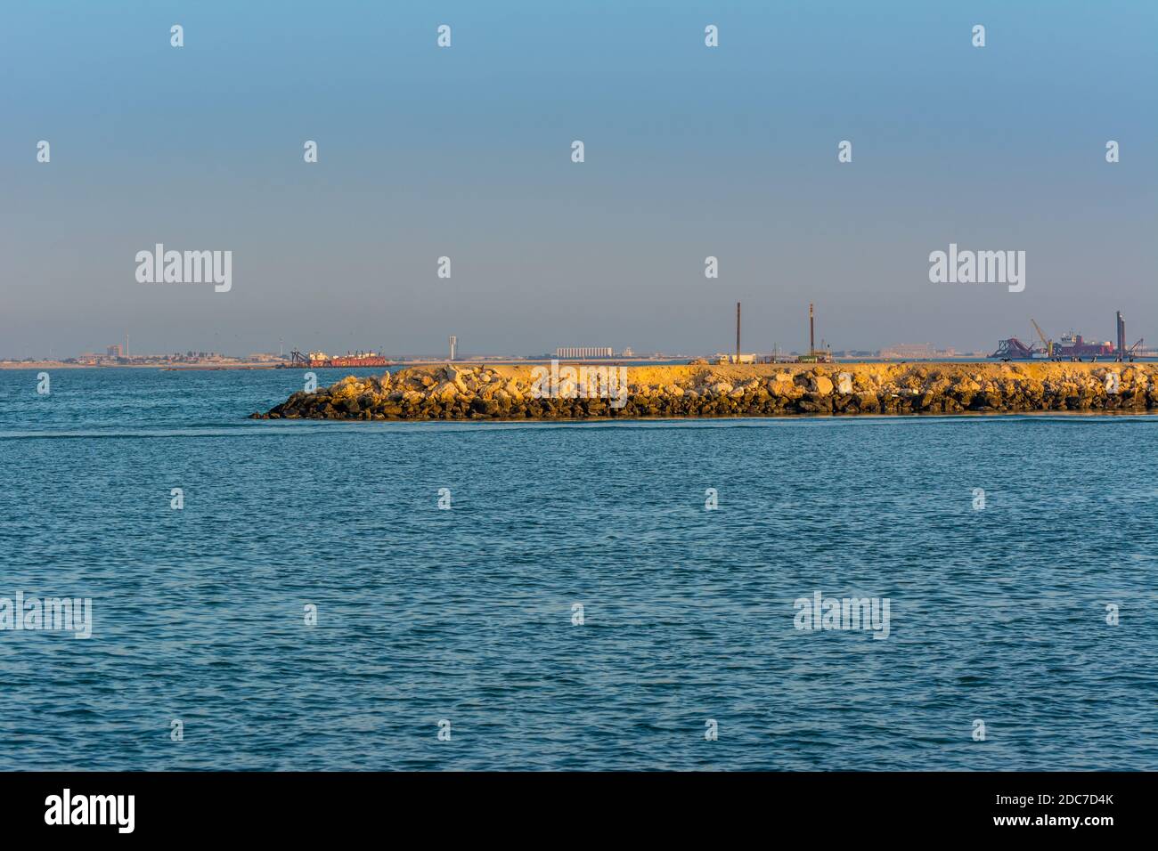 Stone dam under twilight at the sea of Dammam, Kingdom of Saudi Arabia ...