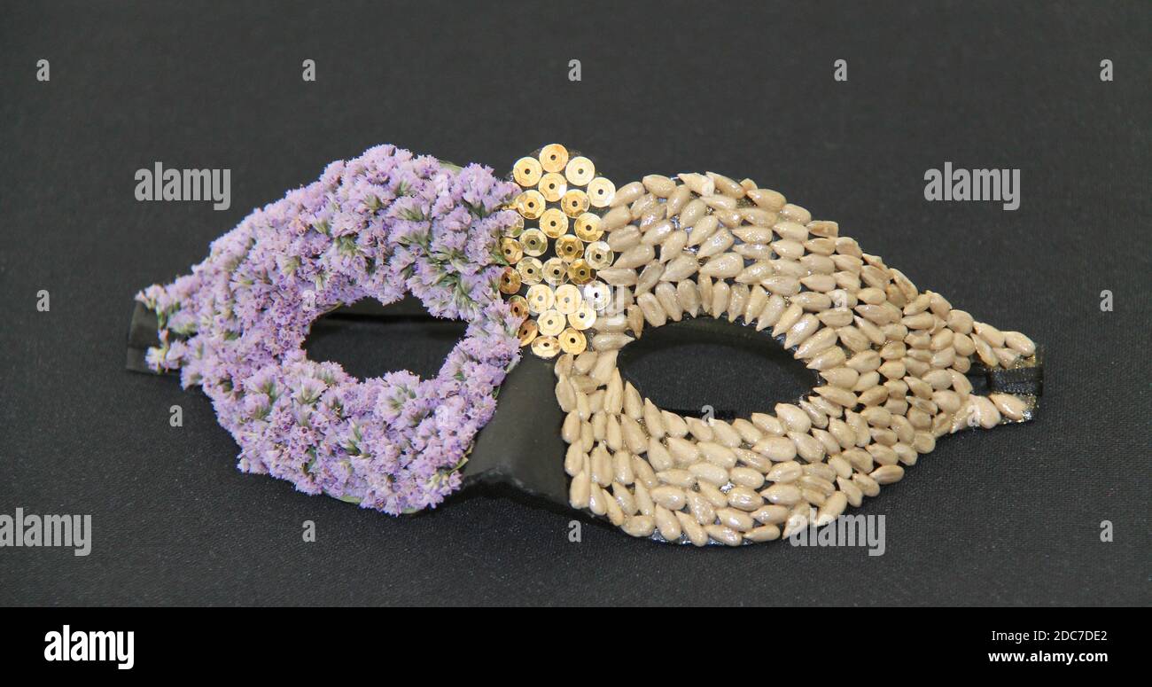 A Masquerade Eye Mask Made with Flowers and Shells Stock Photo - Alamy