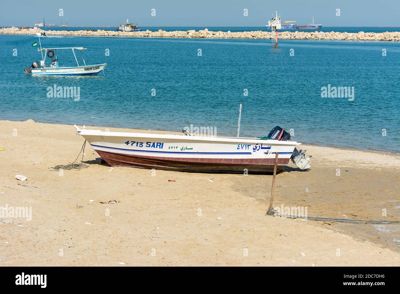 Fishing boat on the beach of the sea at the corniche park, Dammam ...
