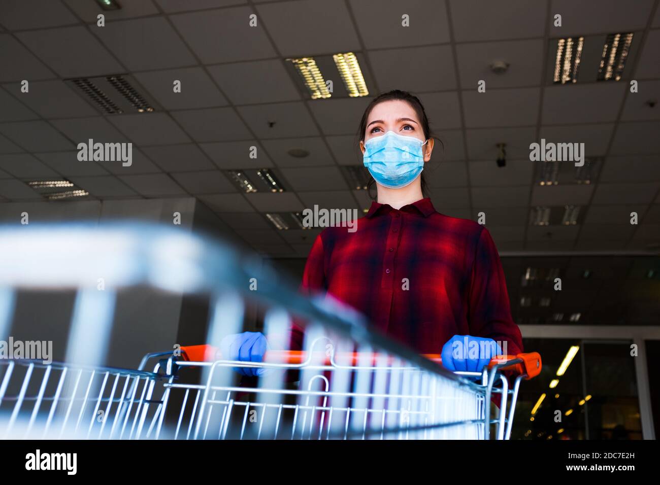 Woman exiting mall hi-res stock photography and images - Alamy