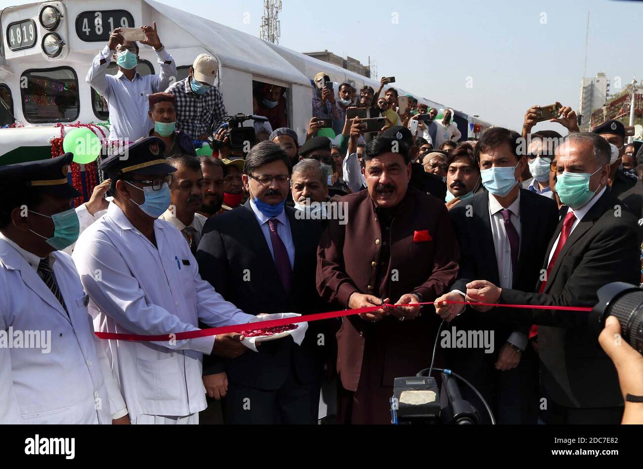 Federal Minister for Railways, Shaikh Rasheed Ahmed along with others ...