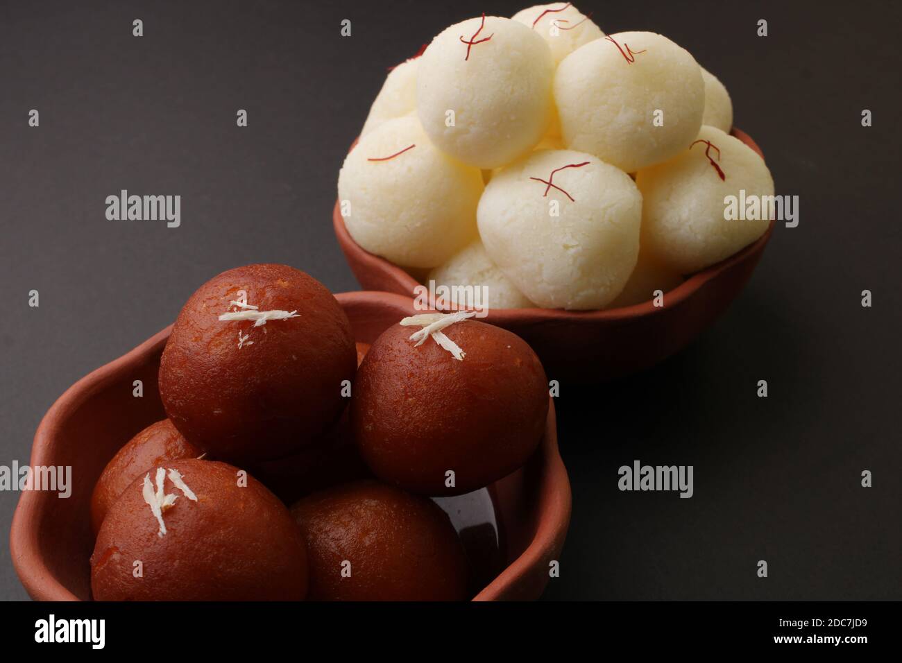 Famous Indian desserts rasgulla/ rosogulla/ roshogulla and gulab jamun ...