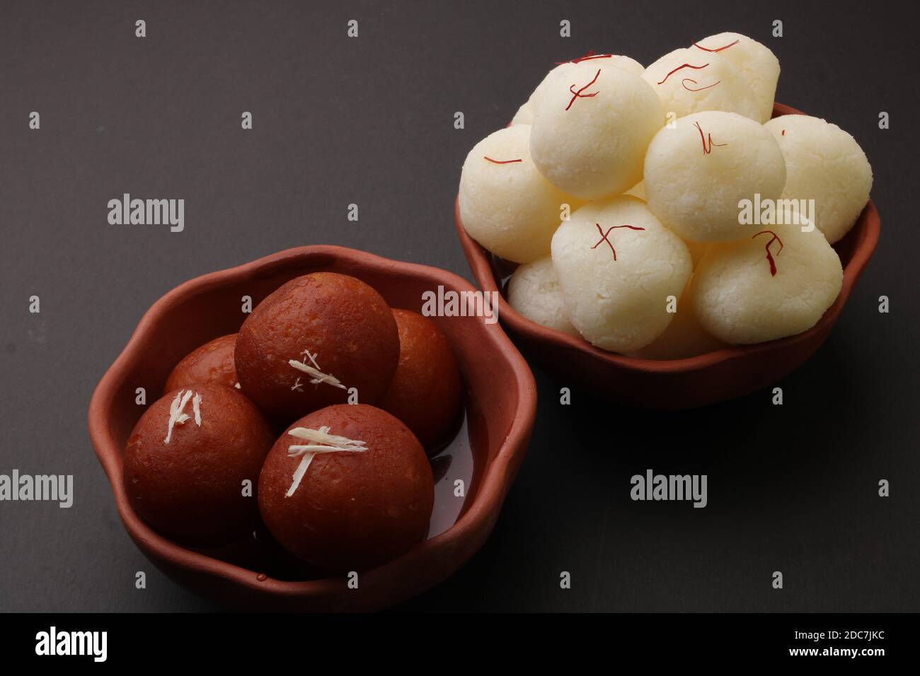 Famous Indian desserts rasgulla/ rosogulla/ roshogulla and gulab jamun ...