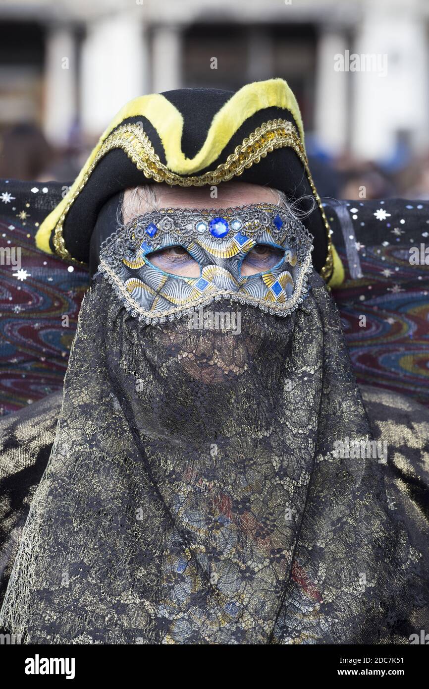 A male in a traditional Venice mask during the world-famous carnival ...