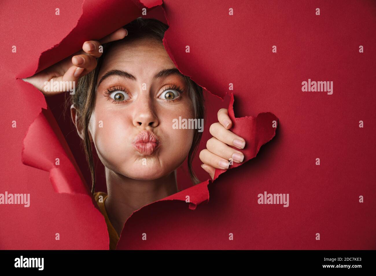 Woman blowing cheeks hi-res stock photography and images - Alamy