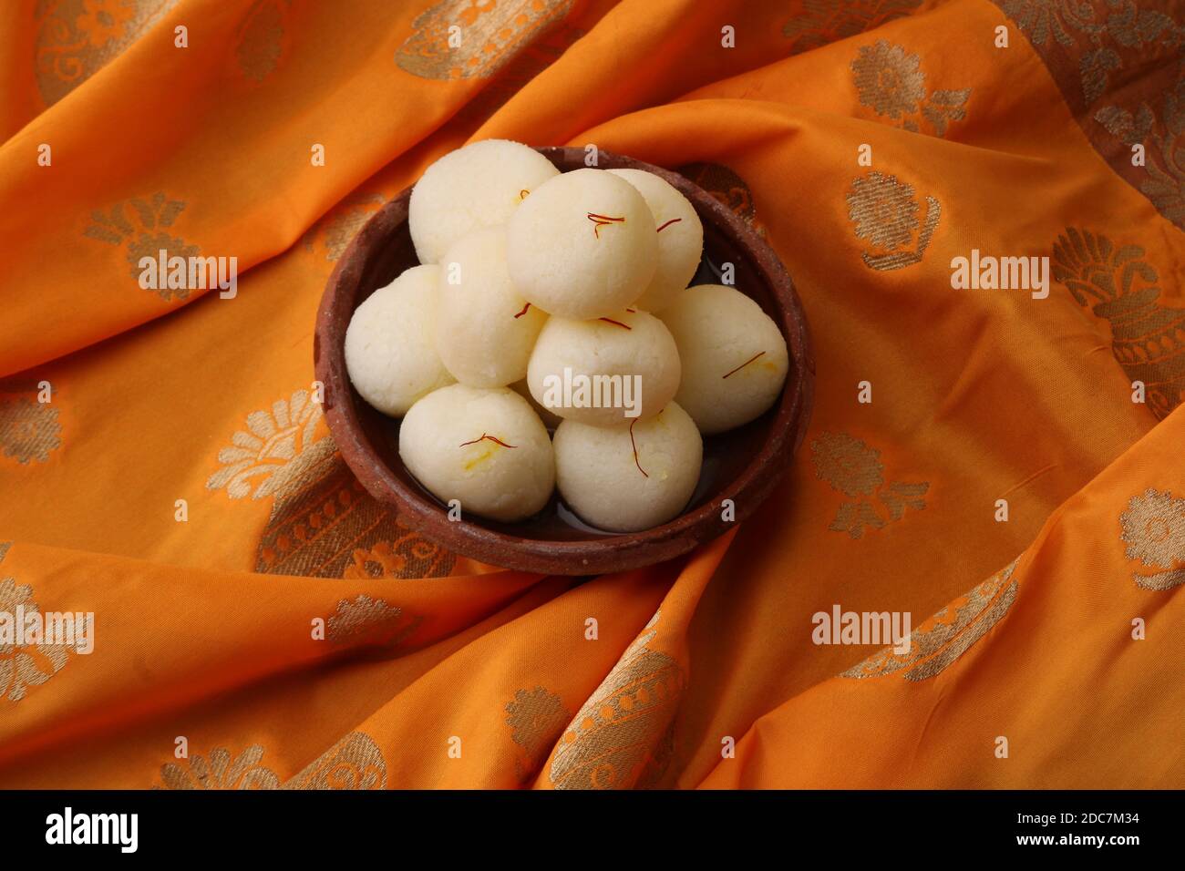 Famous Indian dessest rasgulla/ rosogulla/ roshogulla served in silver ...