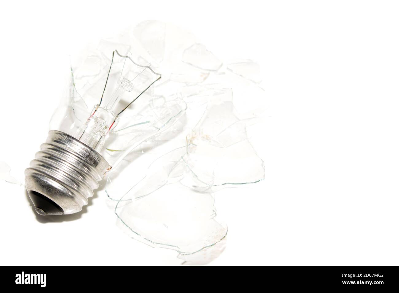 Broken Light bulb on a white background Stock Photo - Alamy