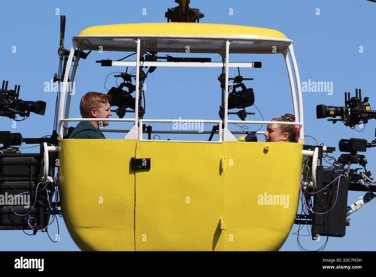 Coronation street cast Sam Aston and Gemini Winter filming cable car ...