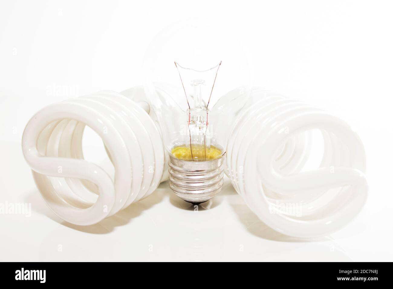 Several different led bulbs and compact fluorescent lamps with the size ...