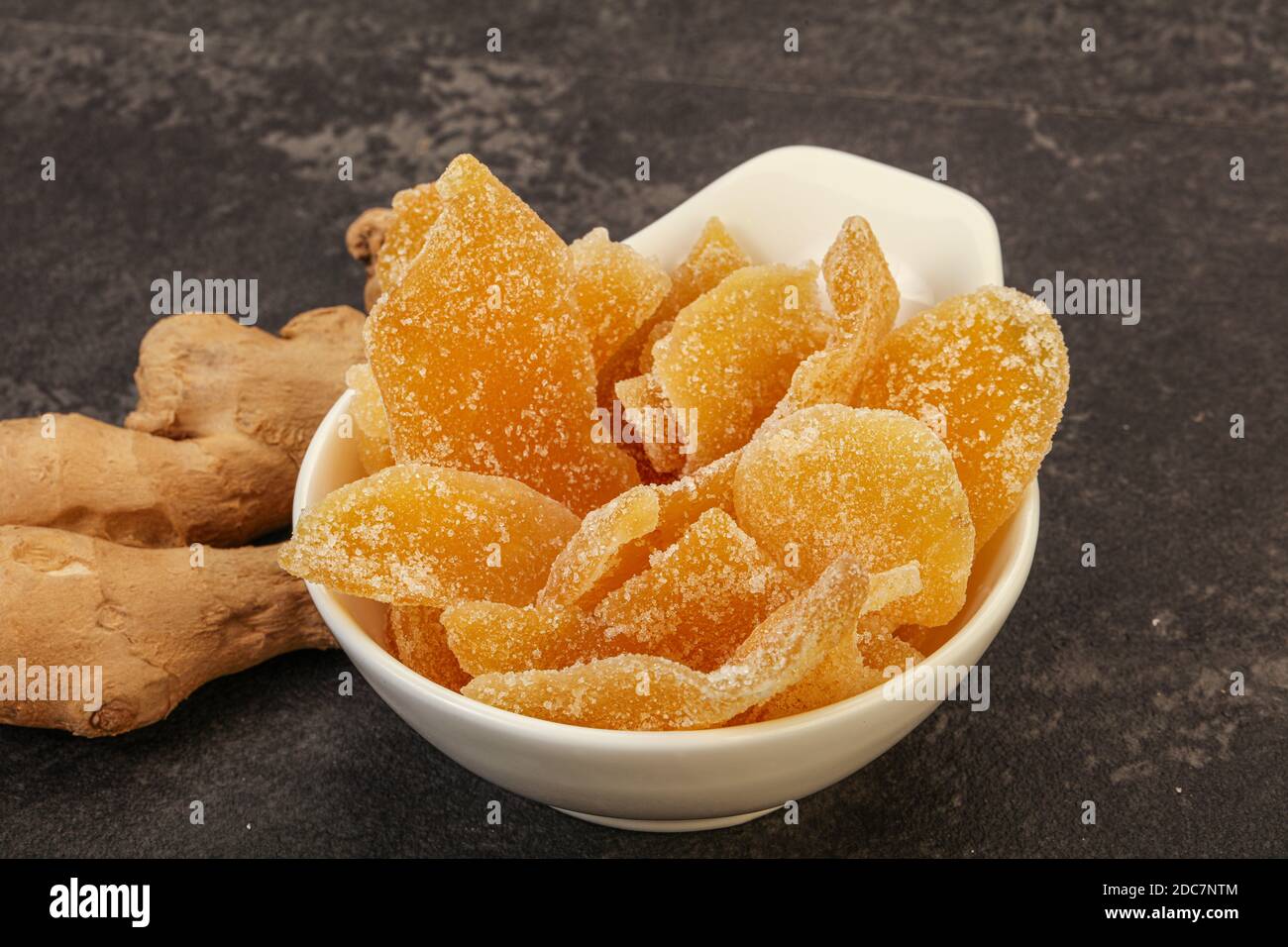 Dry sweet ginger snack in the bowl Stock Photo - Alamy