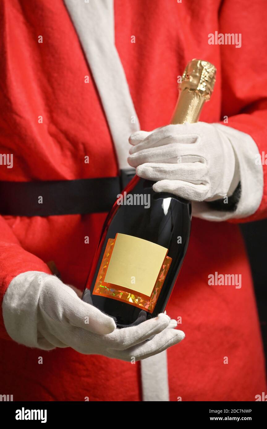 Conceptual Santa Claus Celebrating With Champagne Bottle Stock Photo ...