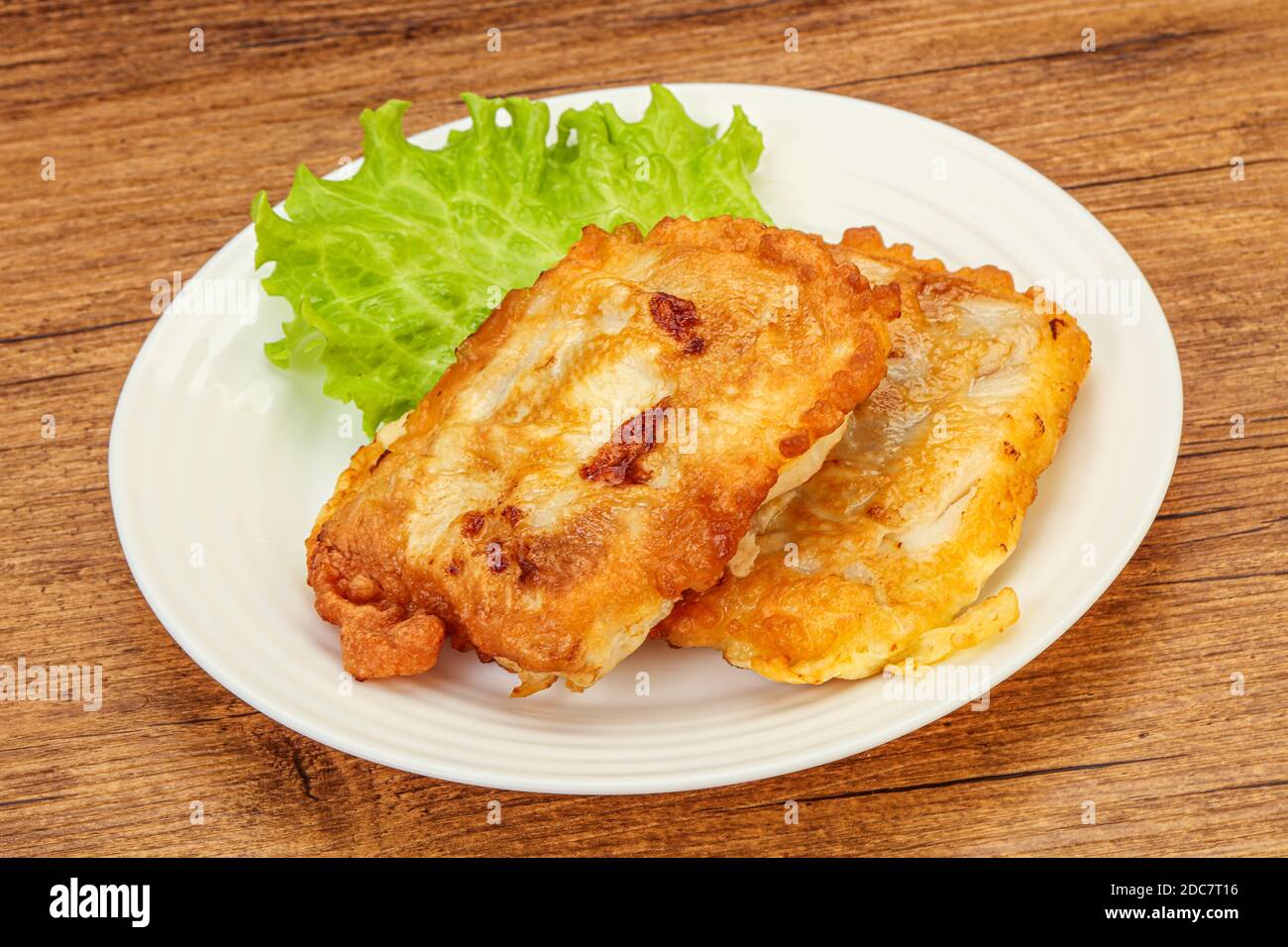 Roasted cod fish in the bread Stock Photo - Alamy