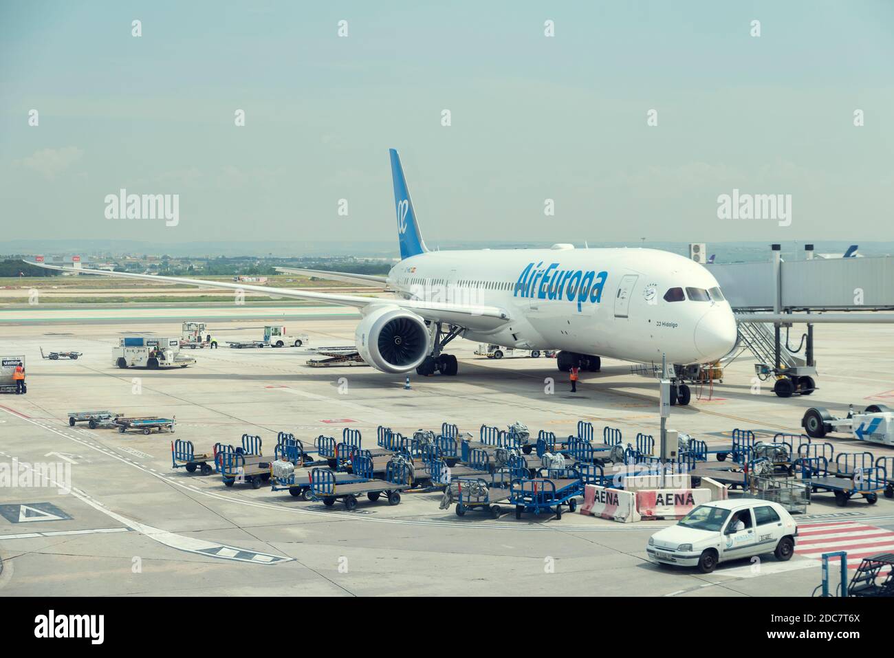 2018, 9 May, Sofia, Bulgaria. Airplane and many luggage carts in a ...