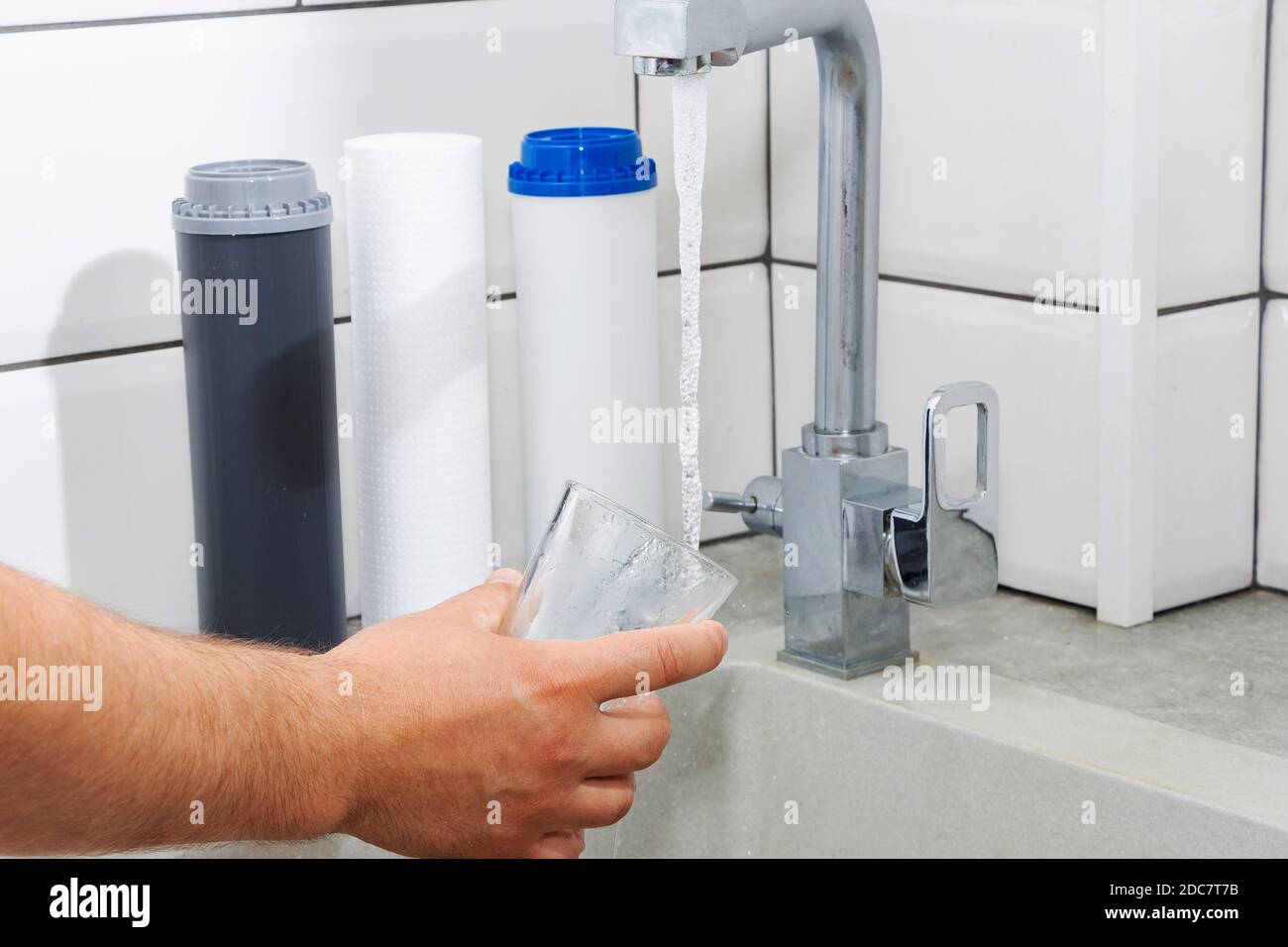 Replacing the water filter. Ecology. Clean water Stock Photo - Alamy